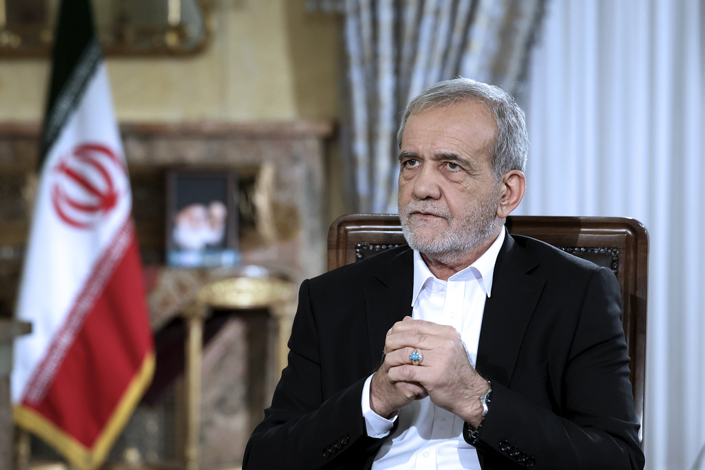 Iran’s new president travels to neighboring Iraq on his first trip ...